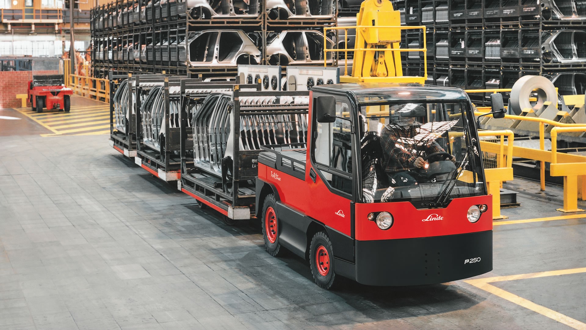 Tratores de reboque e carros de plataforma | Linde Material Handling